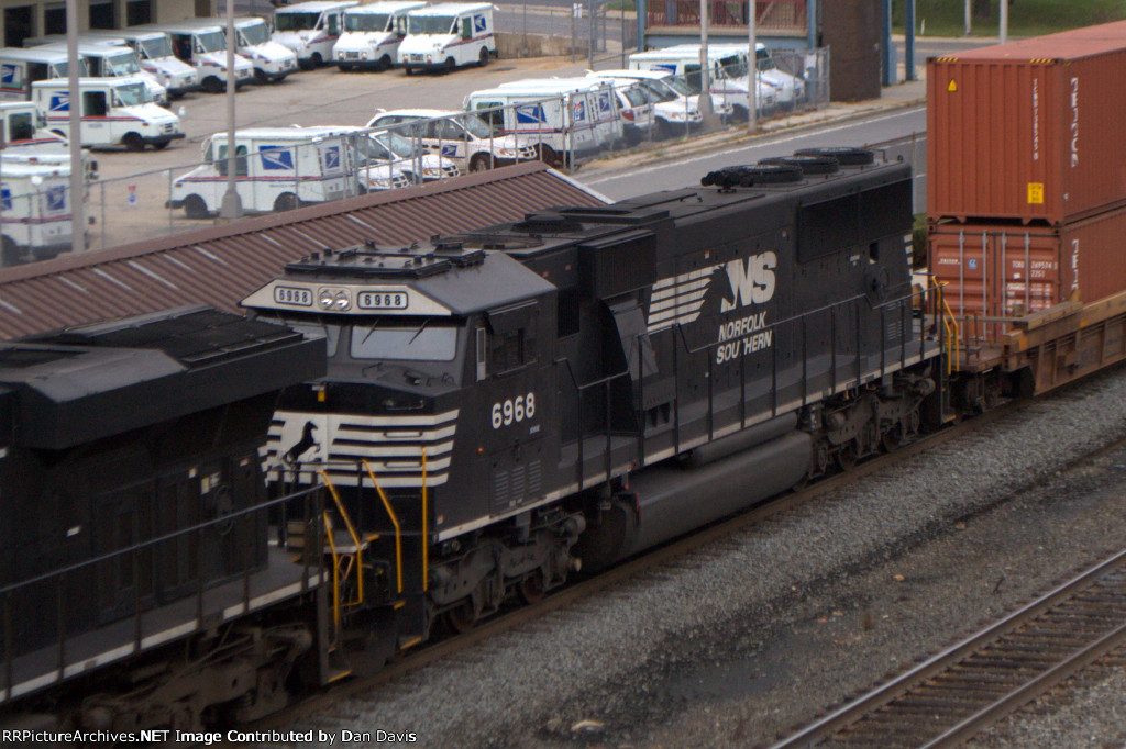 NS SD60E 6968 trails on 23M